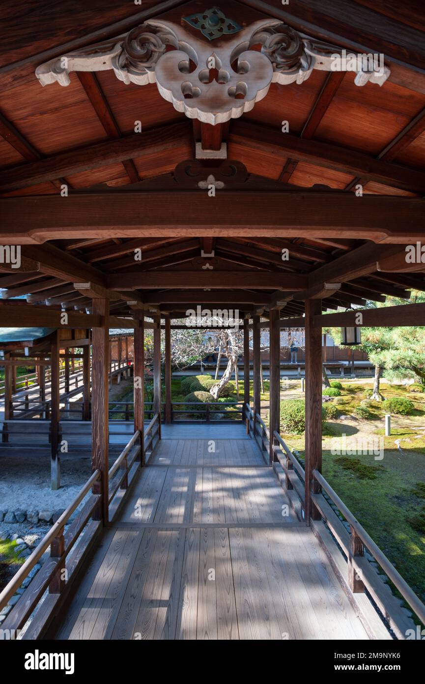 A covered walkway connects buildings at Daikaku-ji Temple, Kyoto, Japan ...