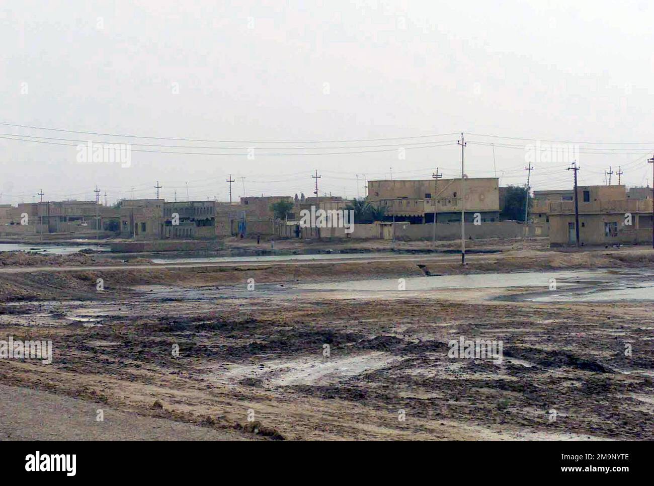 Wide-angle view showing the road exits near the town of Al Rifa, Iraq ...