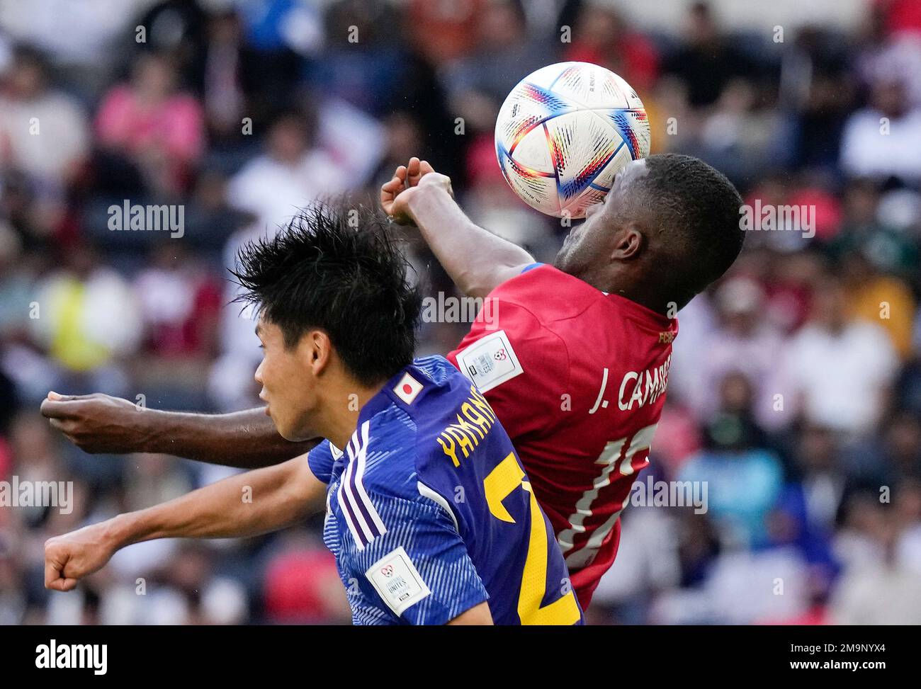 Japan's Miki Yamane, left, and Costa Rica's Joel Campbell, right, challenge for the ball during ...
