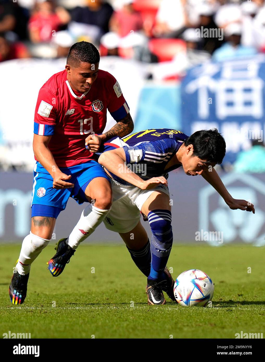 Japan's Daichi Kamada, right, is challenged by Costa Rica's Gerson ...