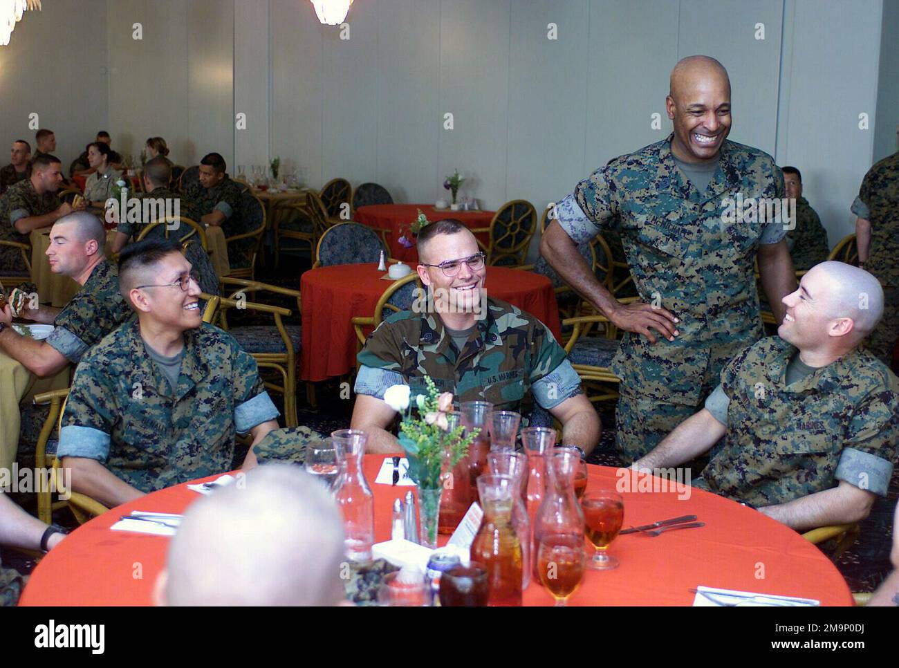 Sergeant Major of the Marine Corps Alford McMichael, (standing), visits the Palms, the e-club ...