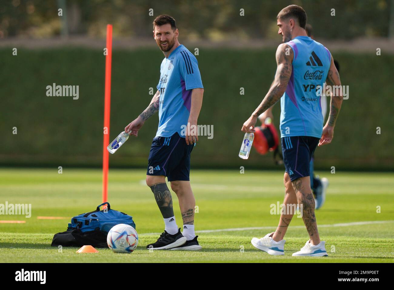 Lionel Messi, left, and Rodrigo De Paul enter to the pitch for a ...