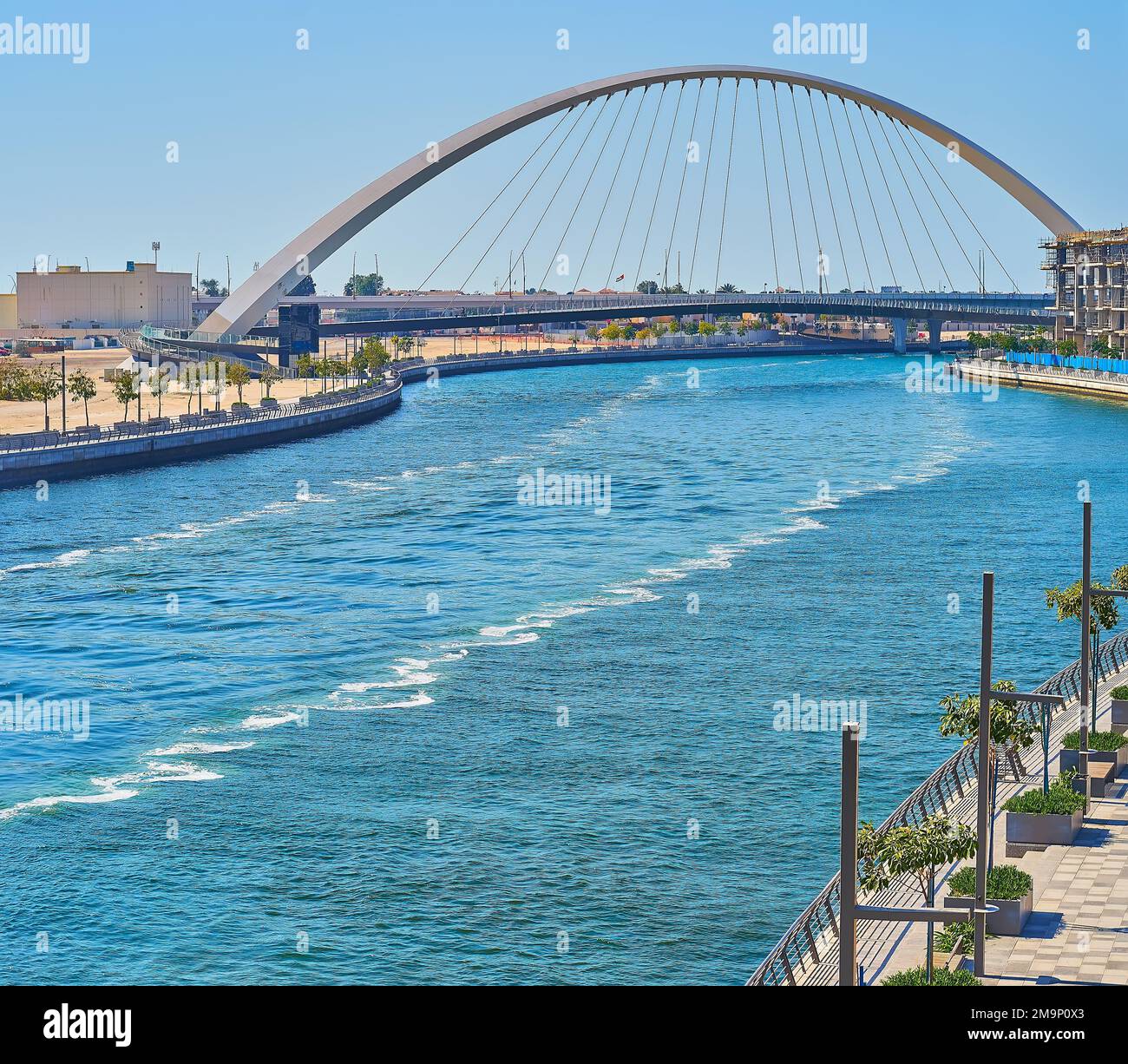 The modern span suspension Tolerance Bridge across Dubai Water Canal ...