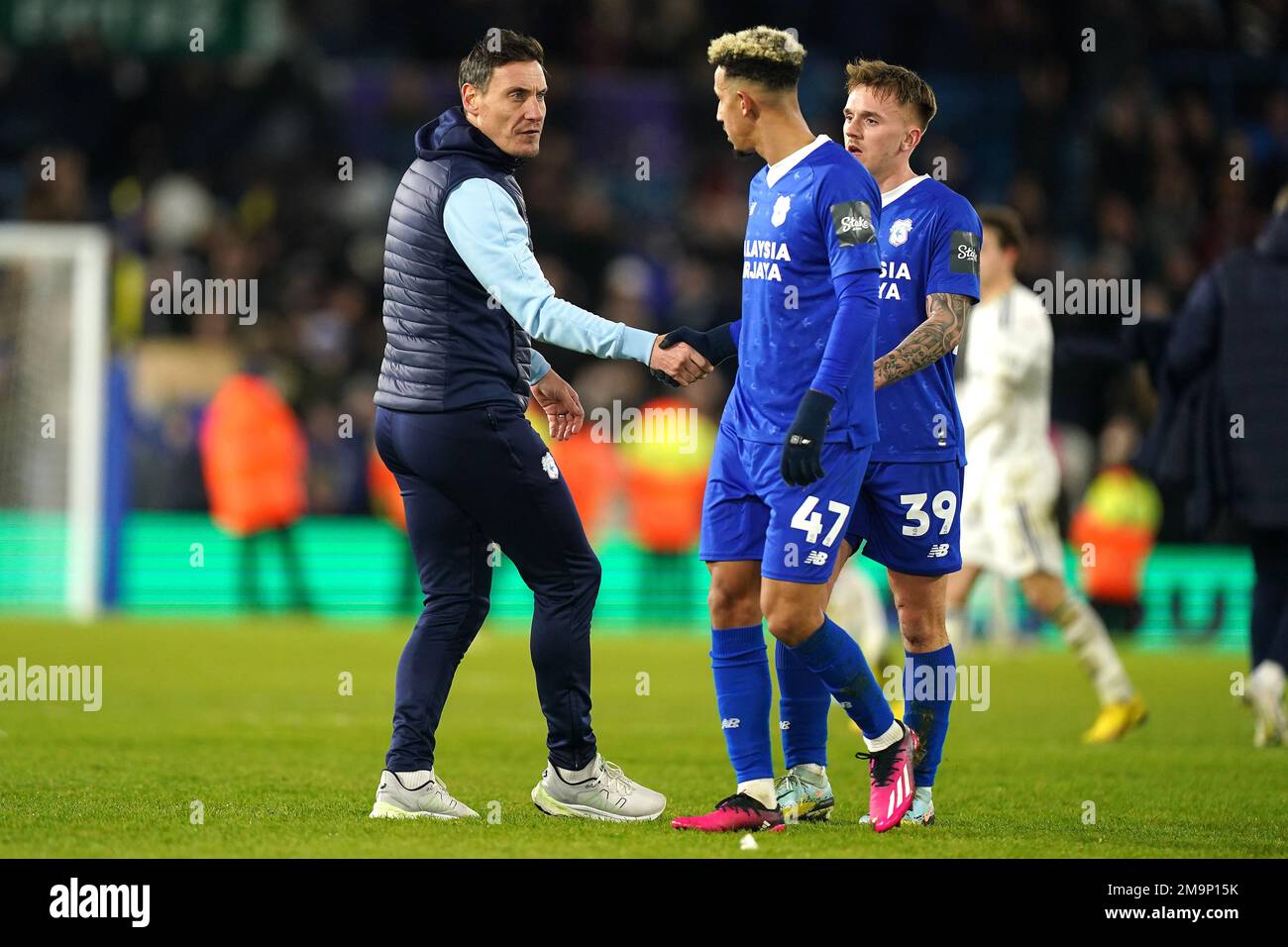 Cardiff City interim manager Dean Whitehead (left) shake hands with ...