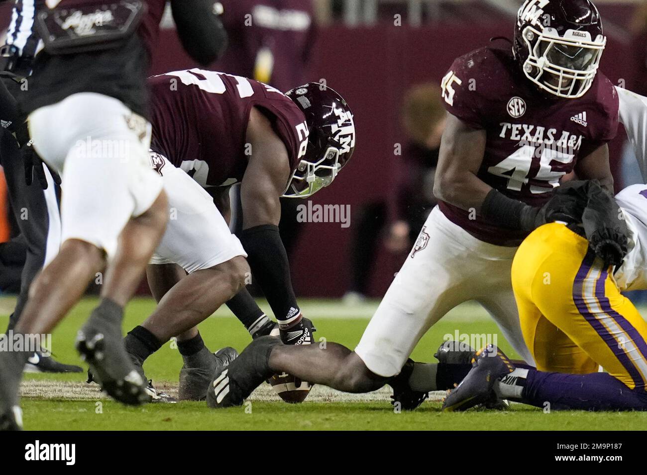 Texas A&M defensive back Demani Richardson (26) picks up a fumble and ...