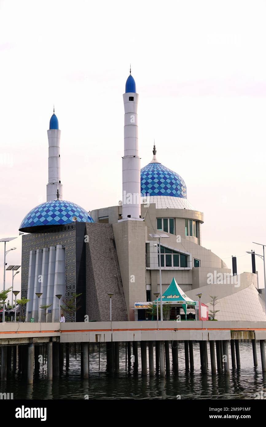 The floating mosque is located on Losari Beach, Makassar Stock Photo ...