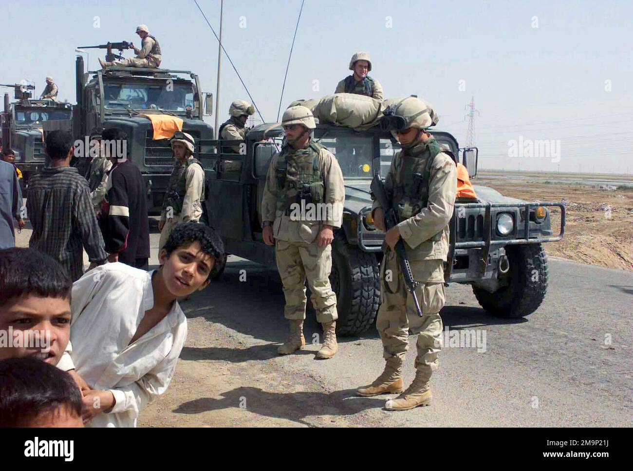 Armed US Marine Corps (USMC) Marines assigned to the 24th Service ...