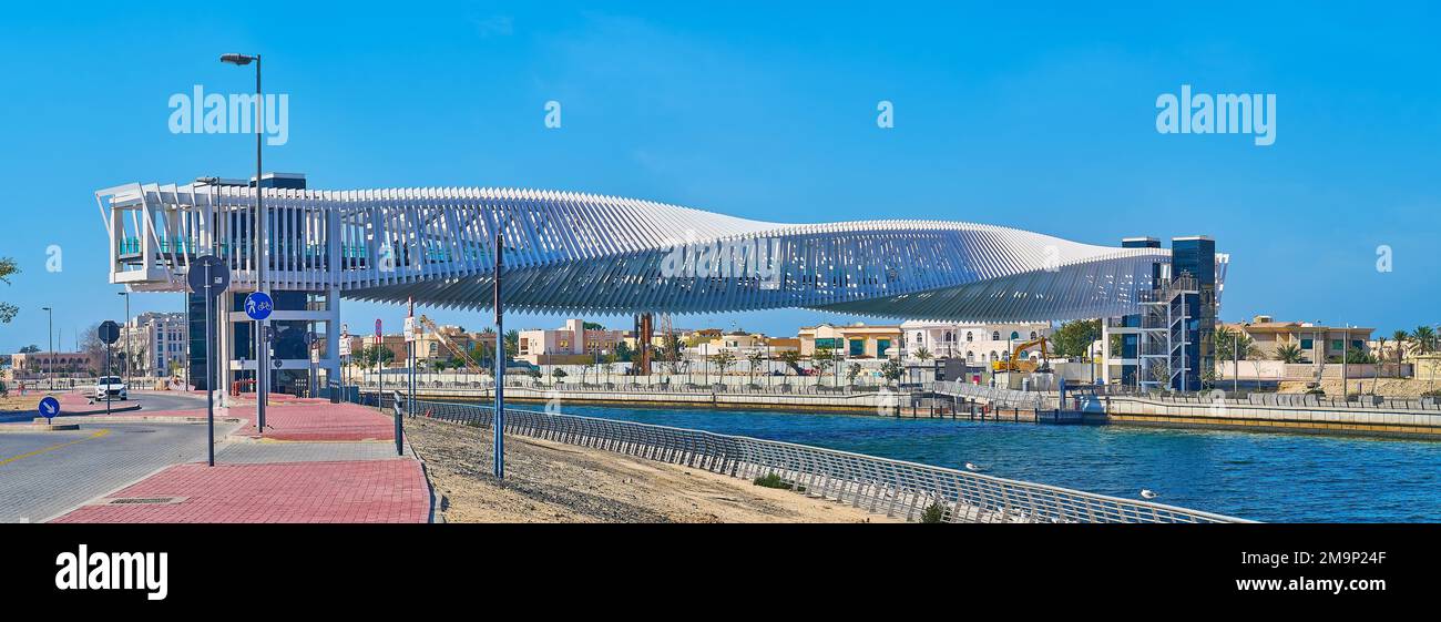 Panoramic view of Dubai Water Canal and futuristic Twisted Bridge ...