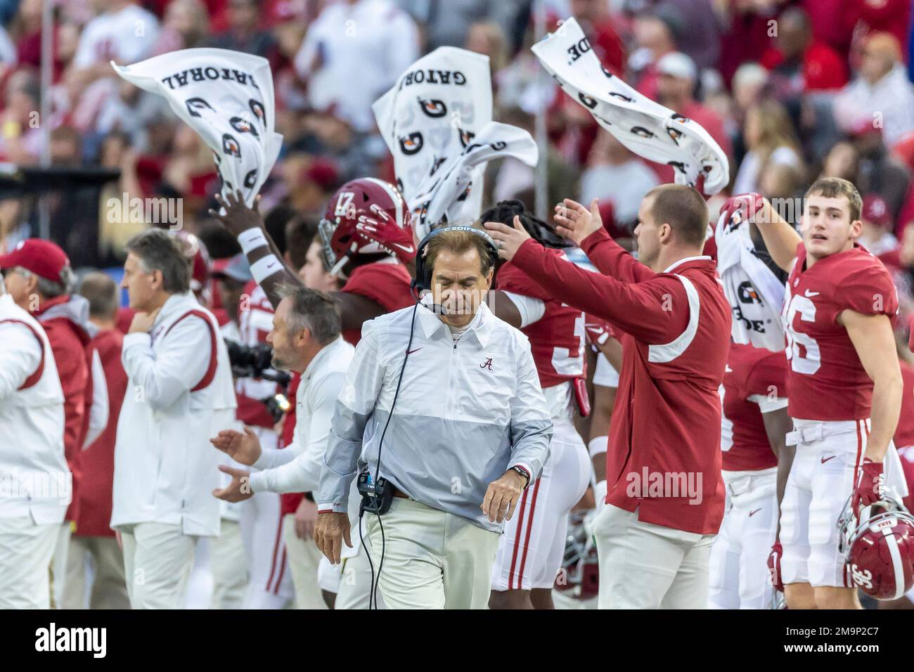 Alabama head coach Nick Saban paces the sidelines as his players get ...