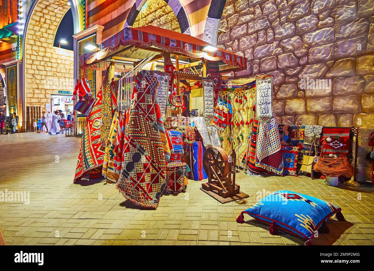 The stall in Global Village Dubai with colored traditional carpets ...