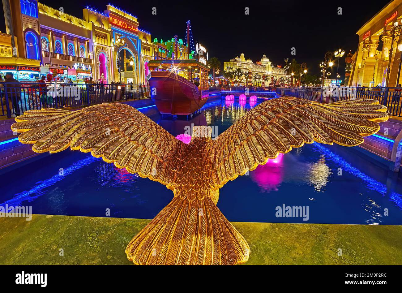 DUBAI, UAE - MARCH 6, 2020: The sculpture of flying golden eagle on the ...