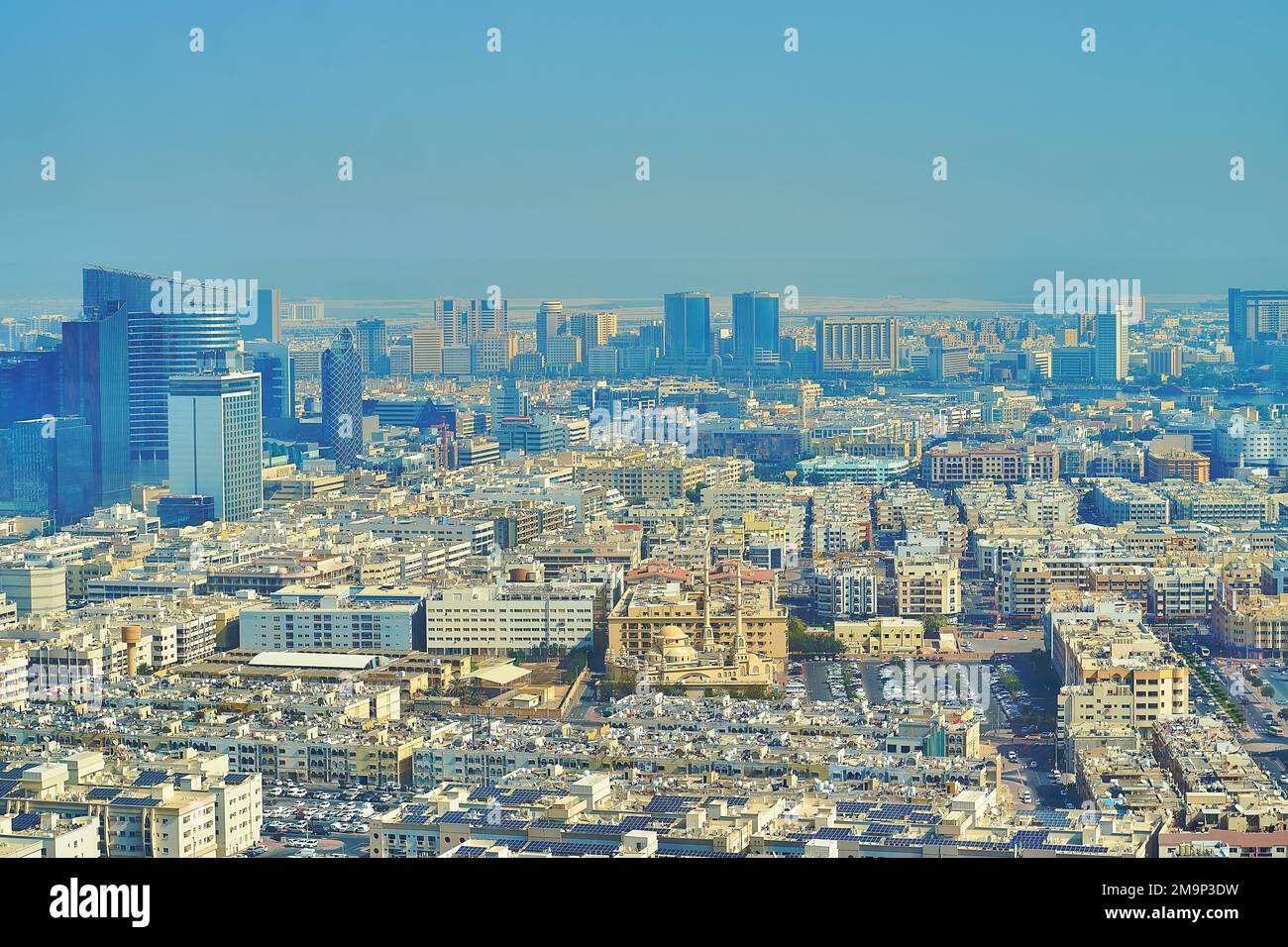 Dense living quarters of Dubai with business centers, Al Karama Mosque ...