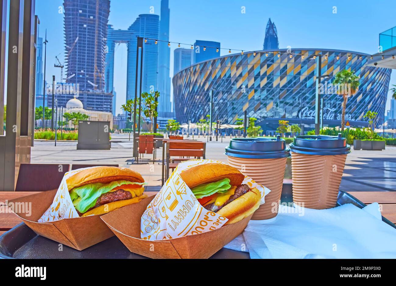 DUBAI, UAE - MARCH 6, 2022: Enjoy delicious burgers and hot coffee in ...