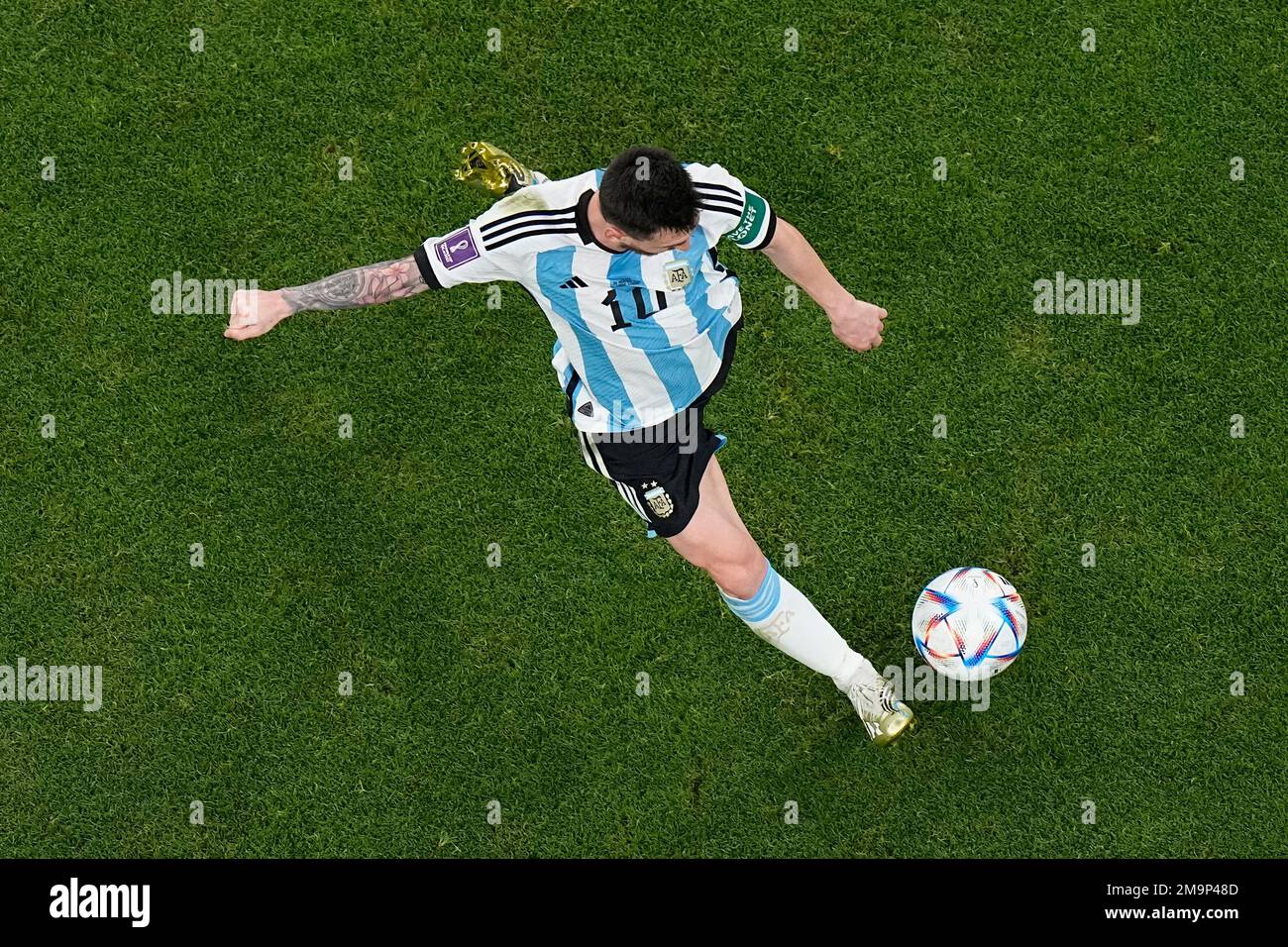 Argentina's Lionel Messi scores his side's opening goal during the ...