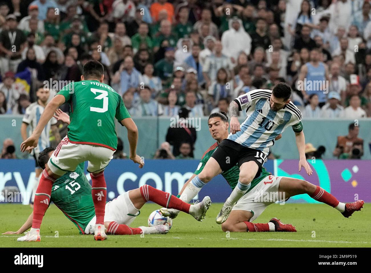 Argentina's Lionel Messi, right, vies for the ball with Mexico's Erick ...
