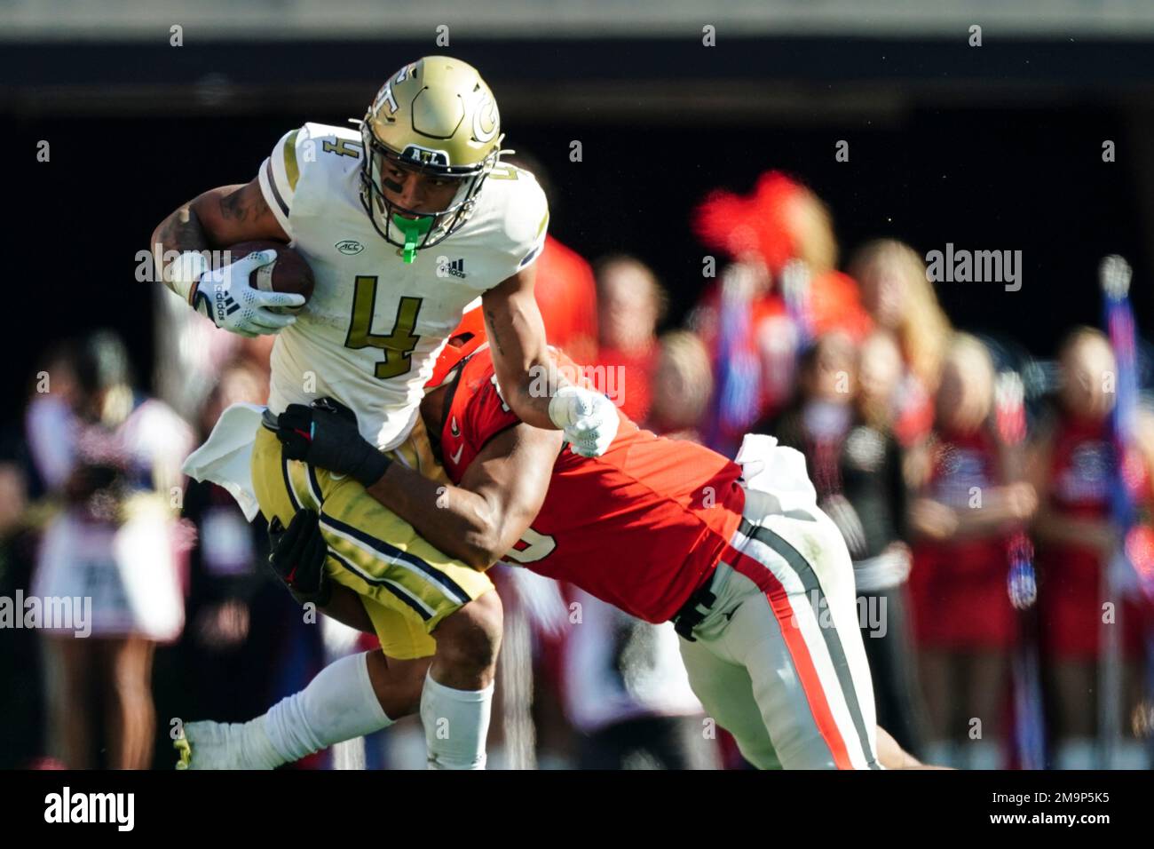 Georgia Tech running back Dontae Smith (4) is stopped by Georgia ...
