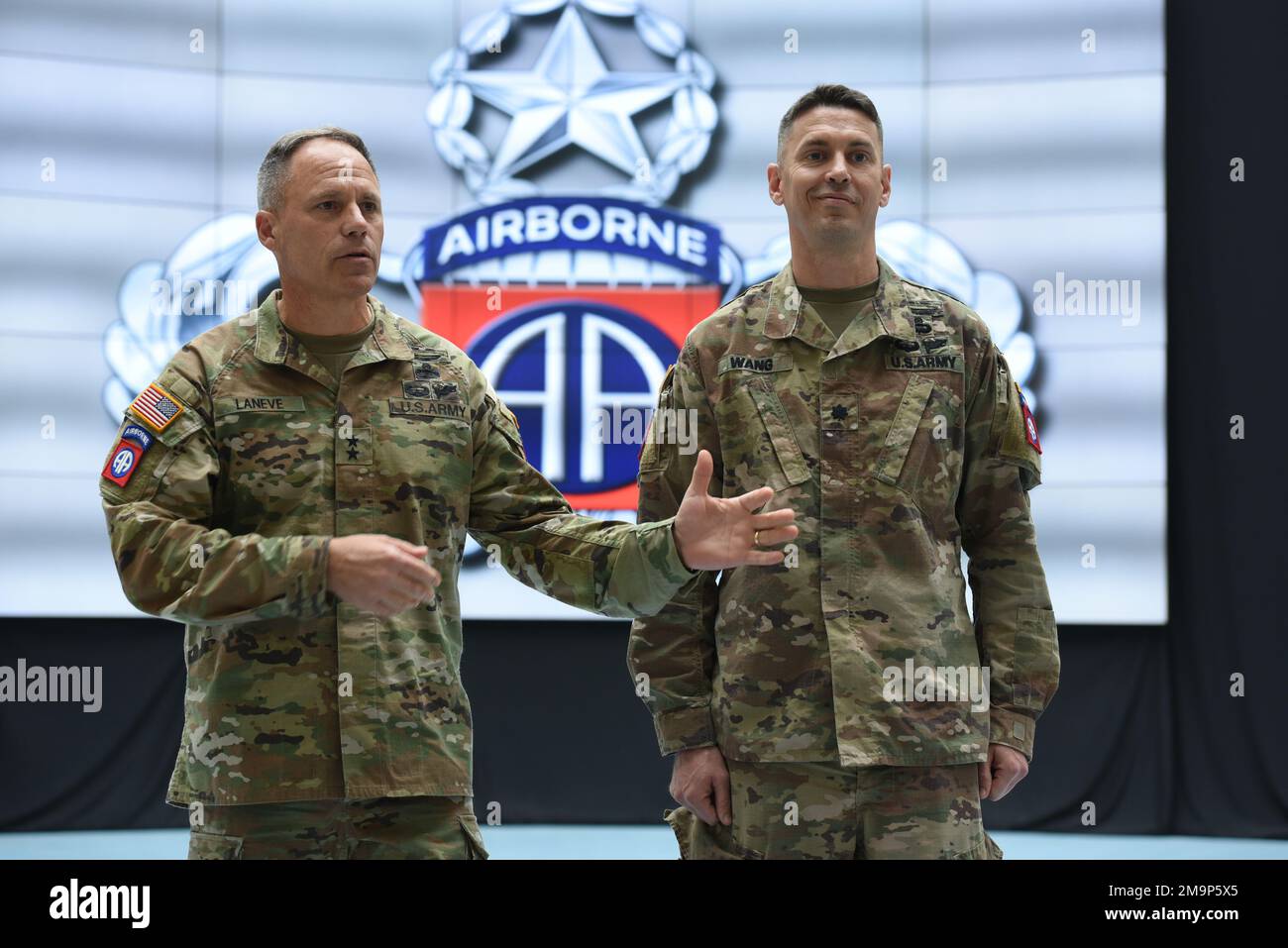 U.S. Army Maj. Gen. Christopher LaNeve, left, commanding general of ...