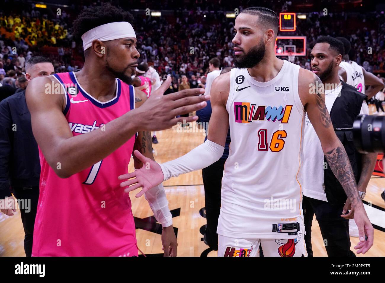 Miami Heat forward Caleb Martin (16) and Washington Wizards guard ...