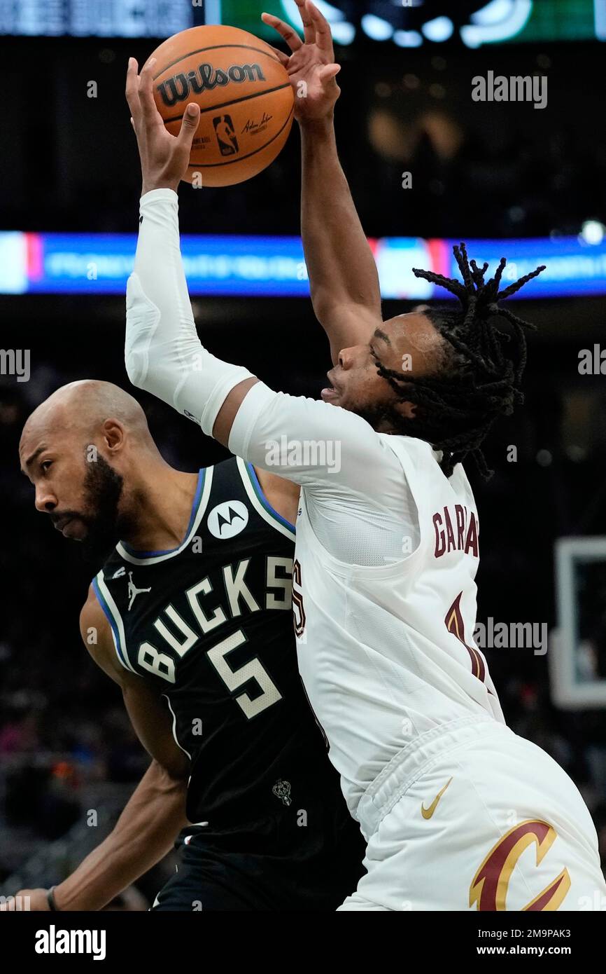 Milwaukee Bucks' Jevon Carter fouls Cleveland Cavaliers' Darius Garland ... Milwaukee Bucks' Jevon Carter fouls Cleveland Cavaliers' Darius Garland ...