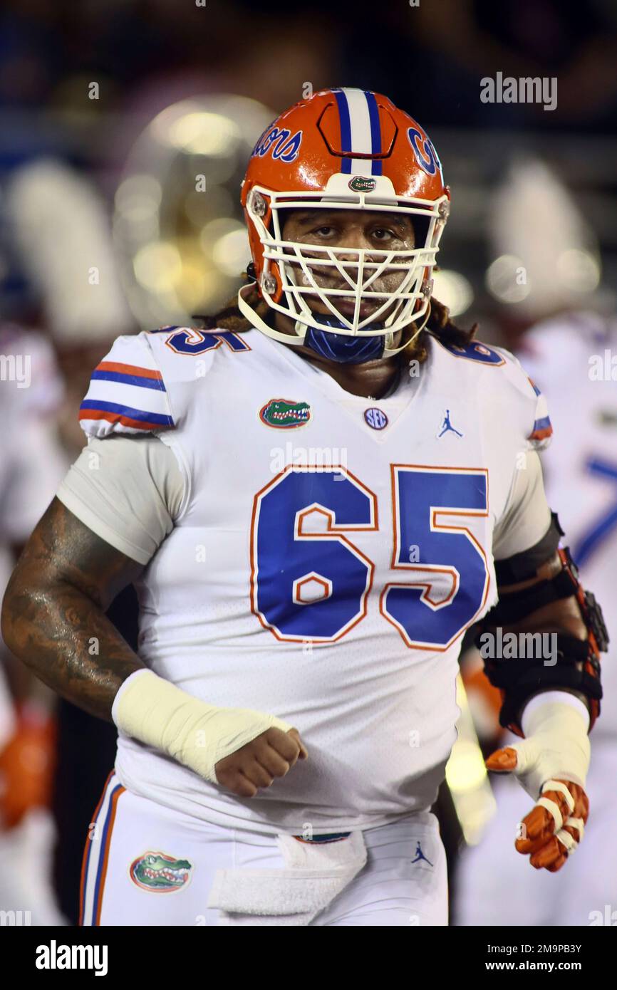 Florida offensive lineman Kingsley Eguakun (65) looks on before an NCAA ...
