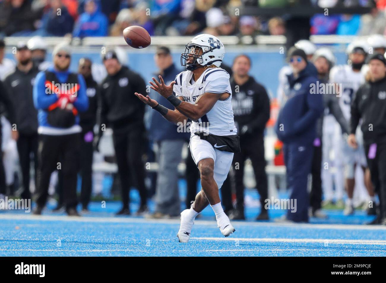 Utah State wide receiver Terrell Vaughn (0) turns to catch the ball on ...