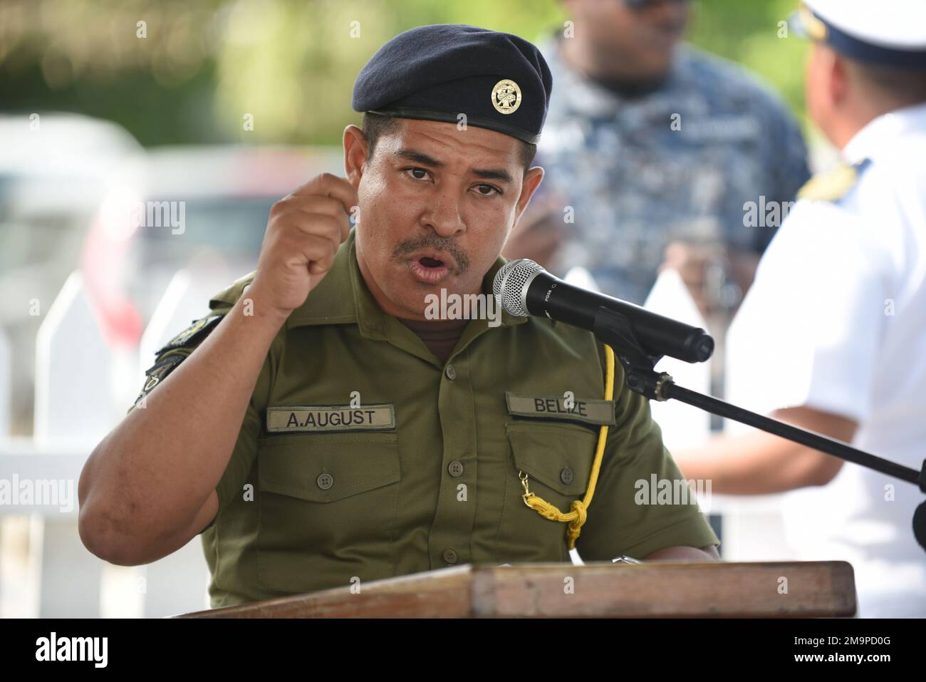 A member of the Belize Defence Force gives a speech regarding the ...