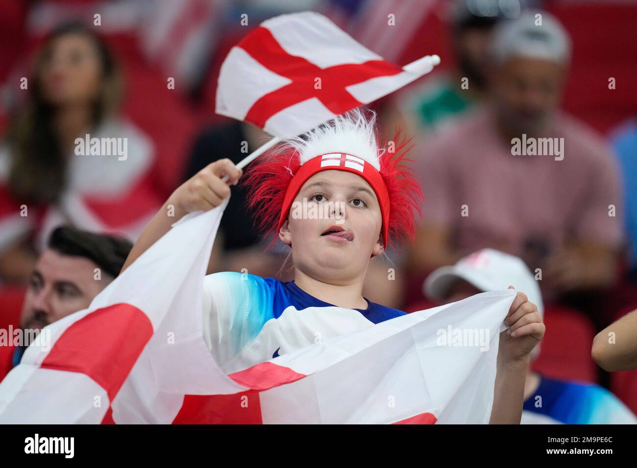 An England supporter waves his national flags prior to the start of the ...