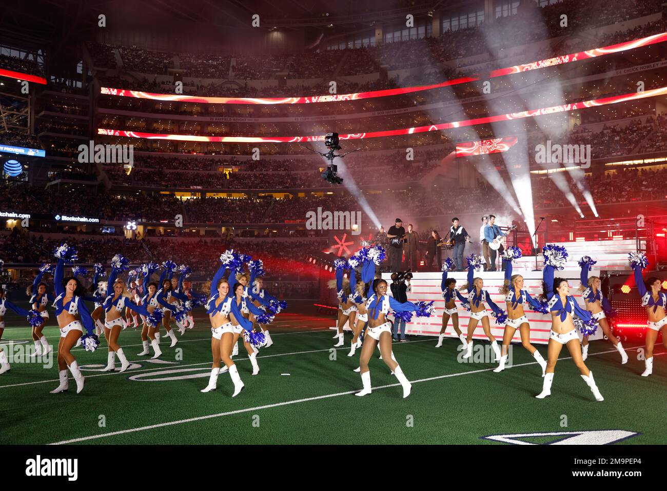 Dallas Cowboys Cheerleaders perform with the Jonas Brothers during ...