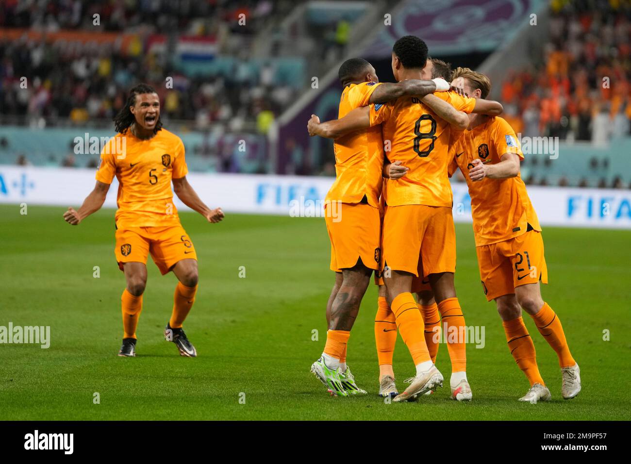 The Netherlands team player's celebrate after scoring the opening goal ...