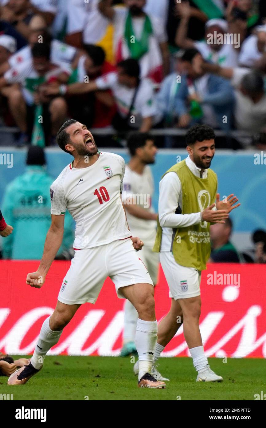 Iran's Karim Ansarifard celebrates after his team scored during the ...