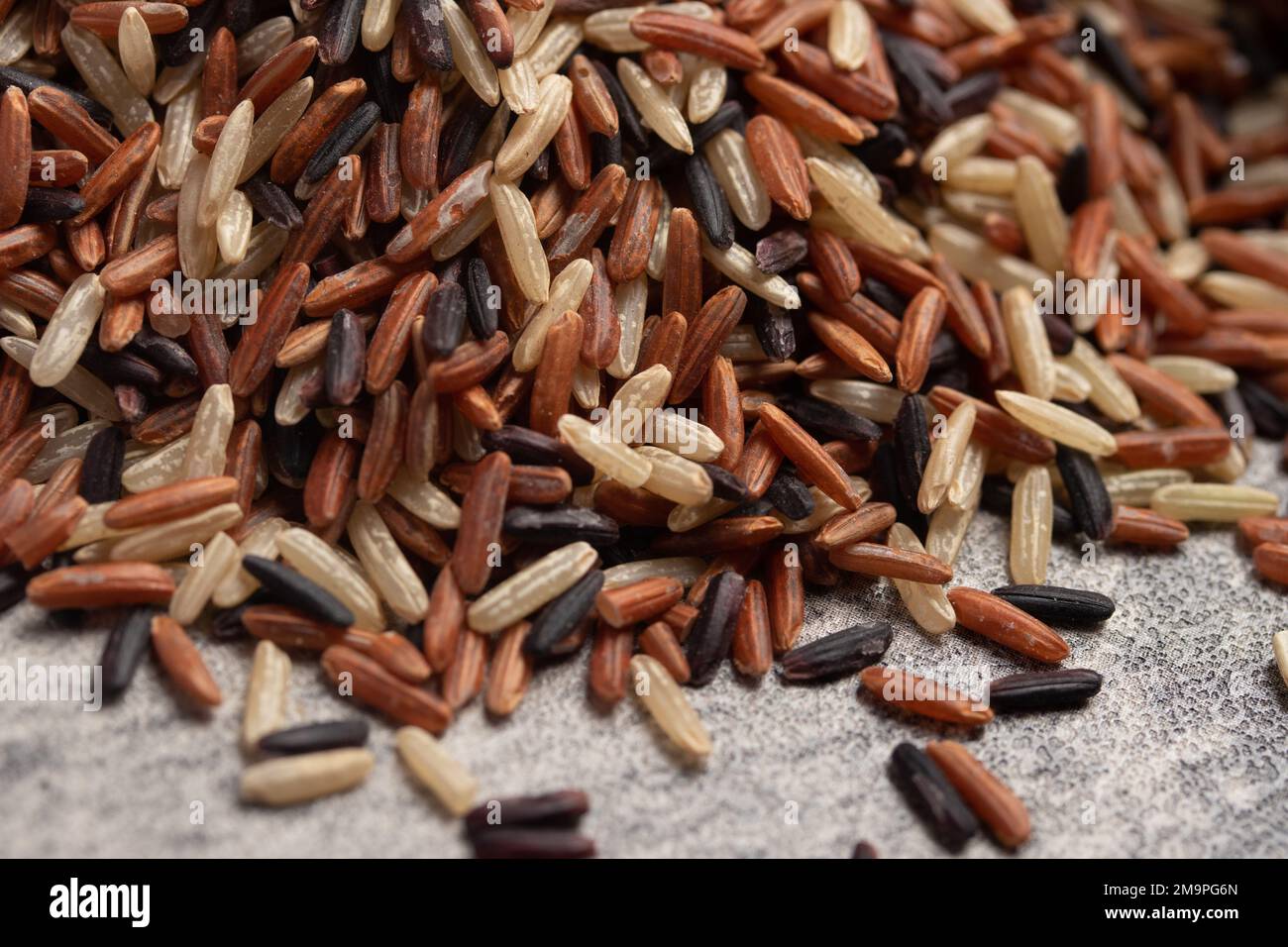 Raw three color jasmine rice.Thai rice grains Stock Photo - Alamy
