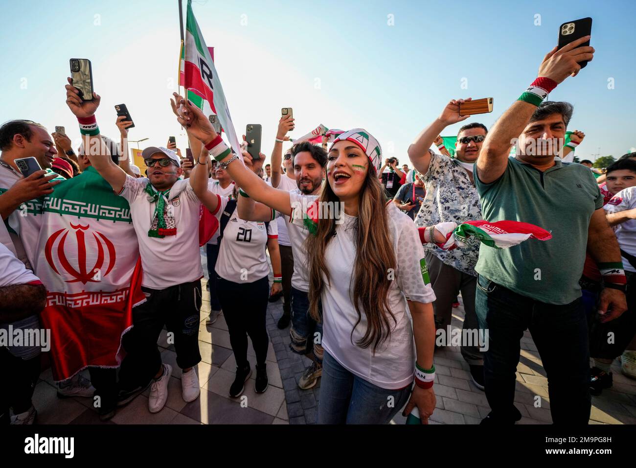 Iranian fans react after their team's win against Wales after the World ...