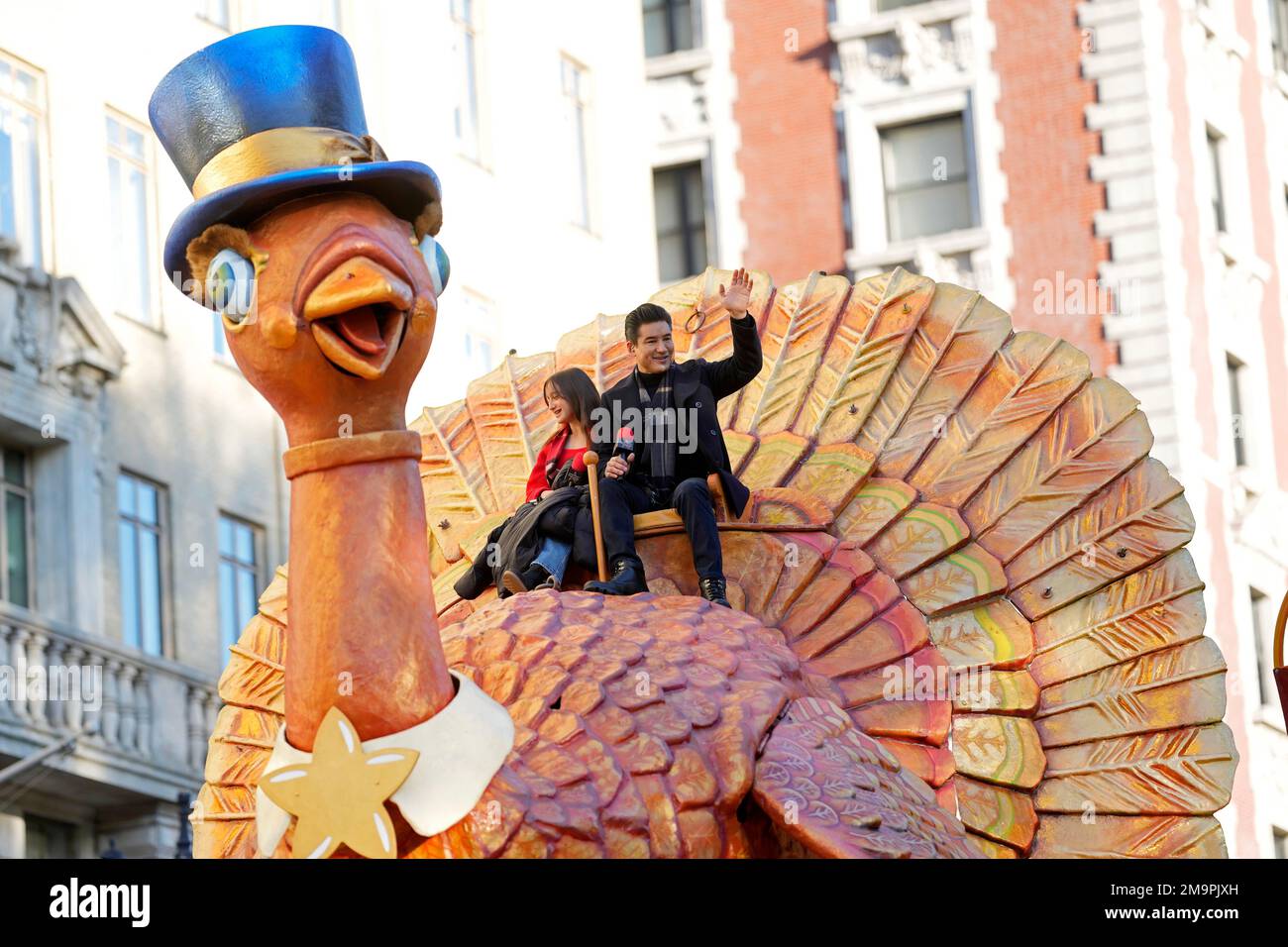 Gia Lopez and Mario Lopez ride the Tom Turkey float in the Macy's ...