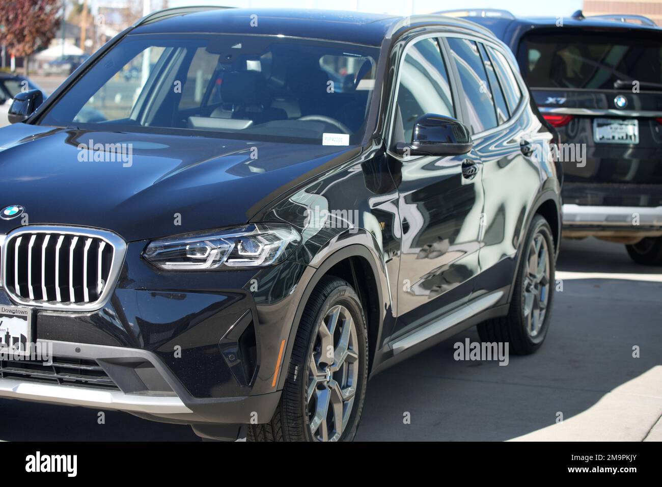 Used X3, front, and X7 sports-utility vehicles sit Thursday, Nov. 25 ...