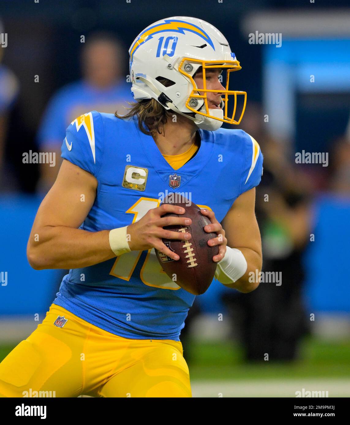 Los Angeles Chargers quarterback Justin Herbert sets to pass during an ...