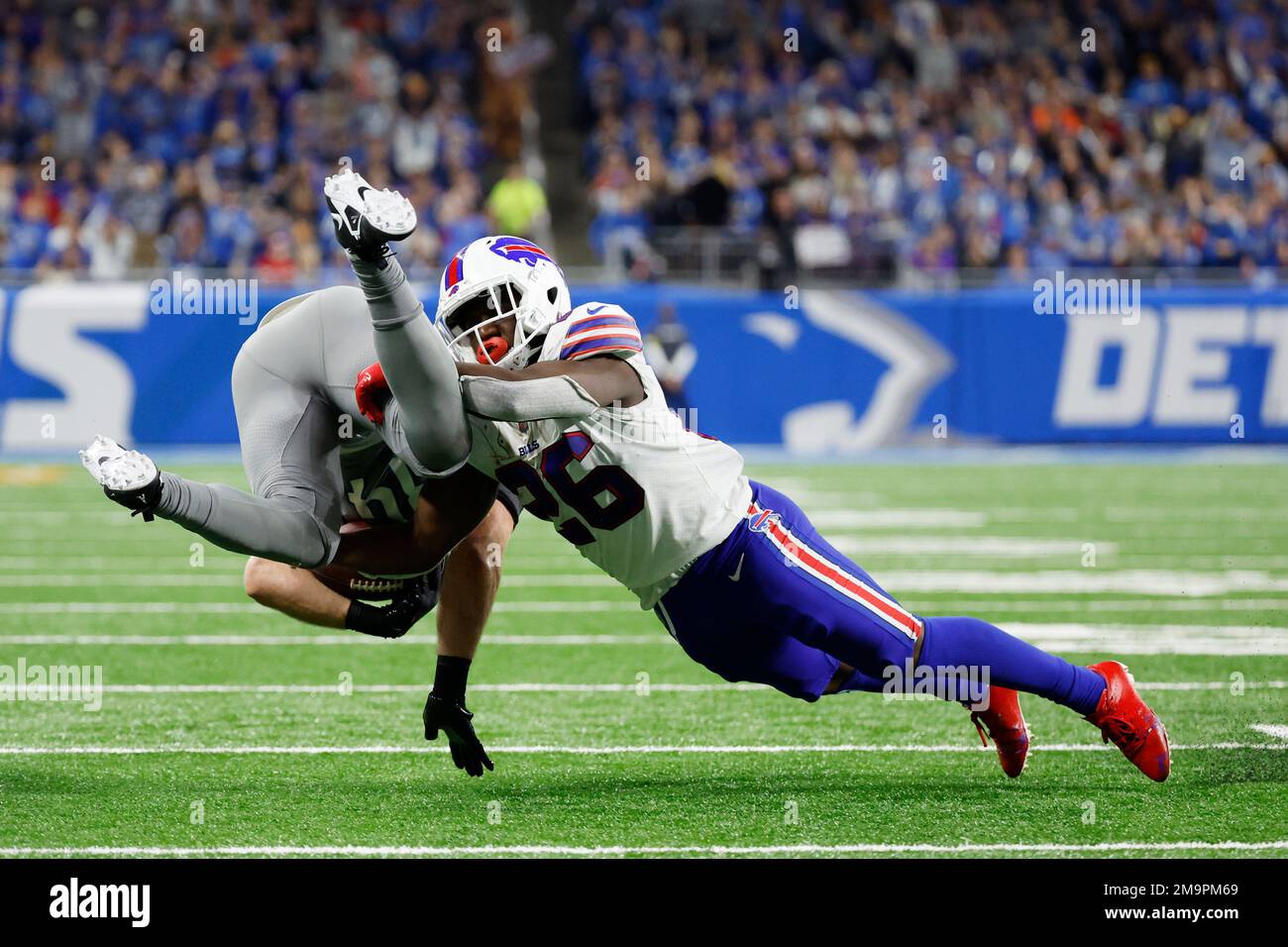Detroit Lions linebacker Alex Anzalone (34) is tackled by Buffalo Bills ...