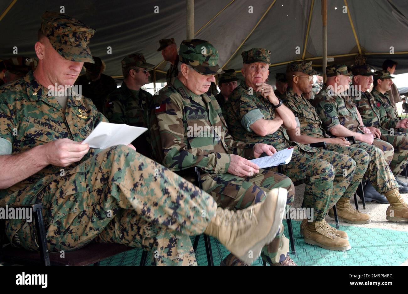 US Marine Corps (USMC) Major (MAJ) Scott Campbell (foreground ...