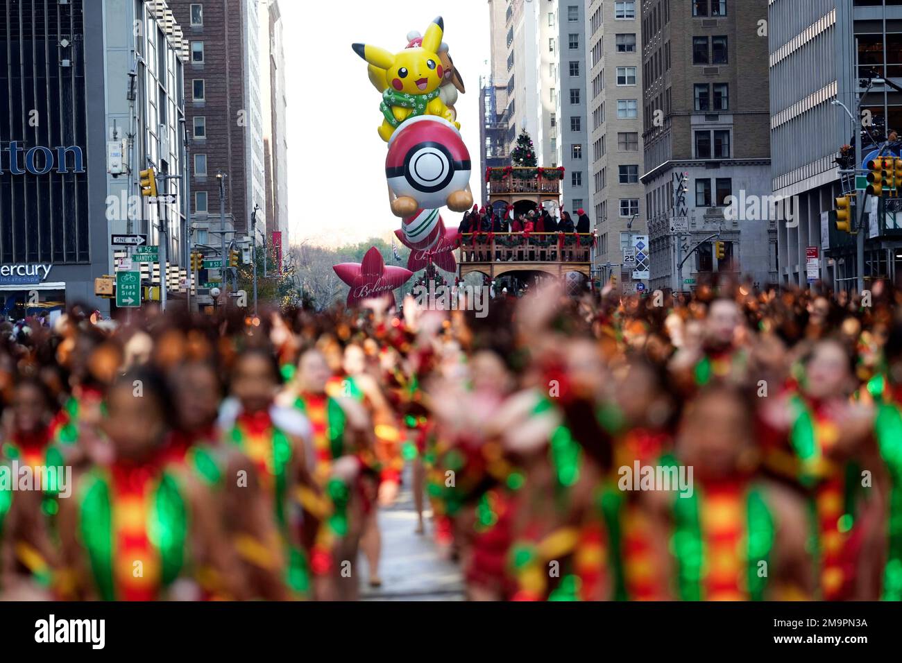 The Pikachu and Eevee balloon floats in the Macy's Thanksgiving Day ...