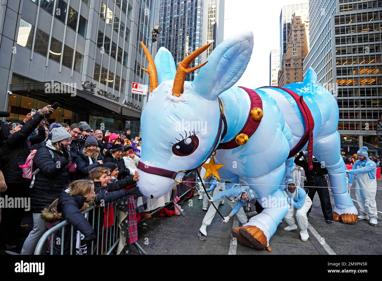 Tiptoe the balloon puppet moves down 6th Avenue in the Macy's ...