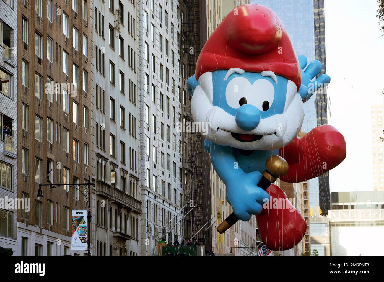 The Papa Smurf balloon floats in the Macy's Thanksgiving Day Parade on ...