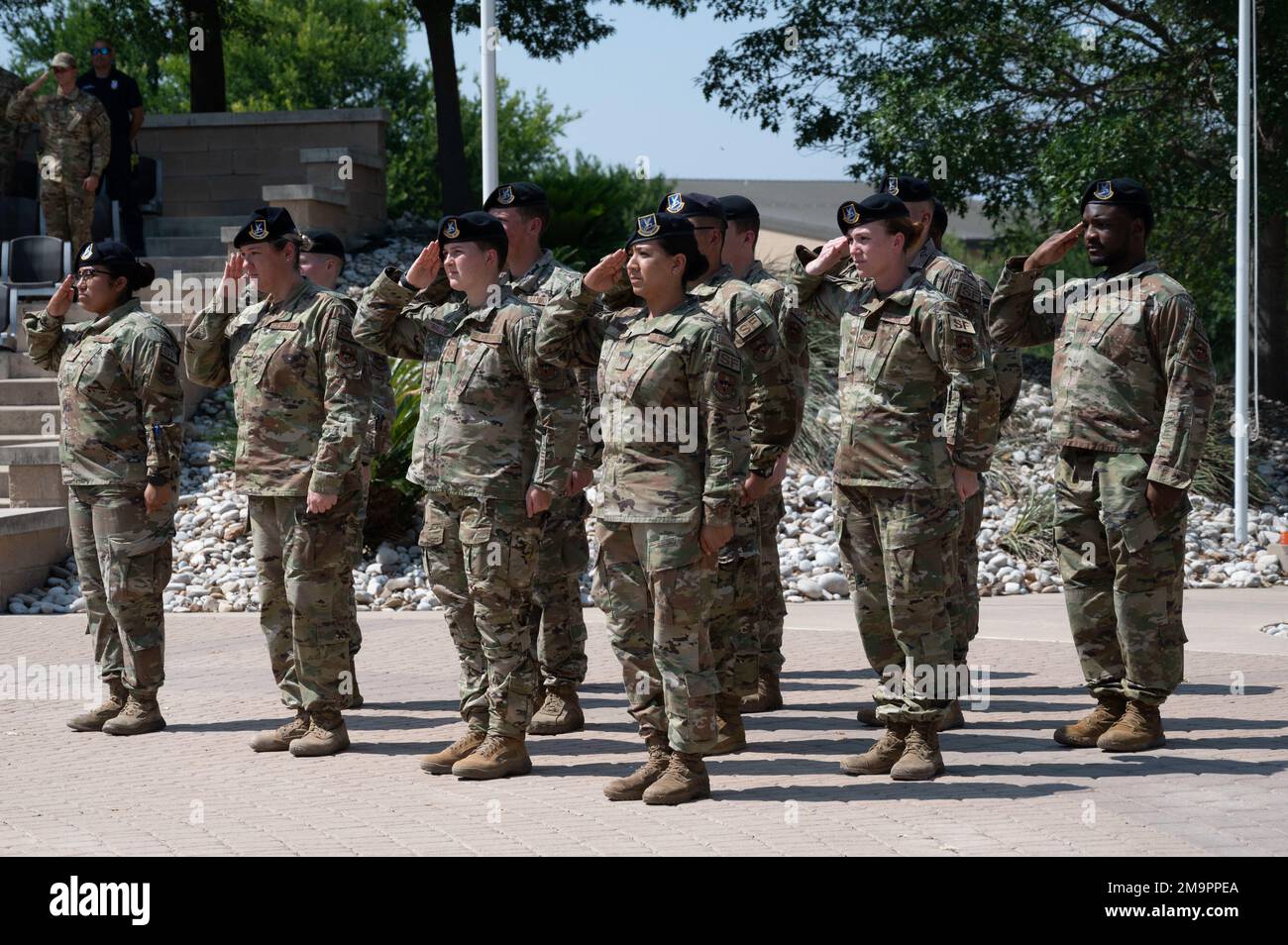 U.S. Air Force 47th Security Forces Squadron defenders salute during ...