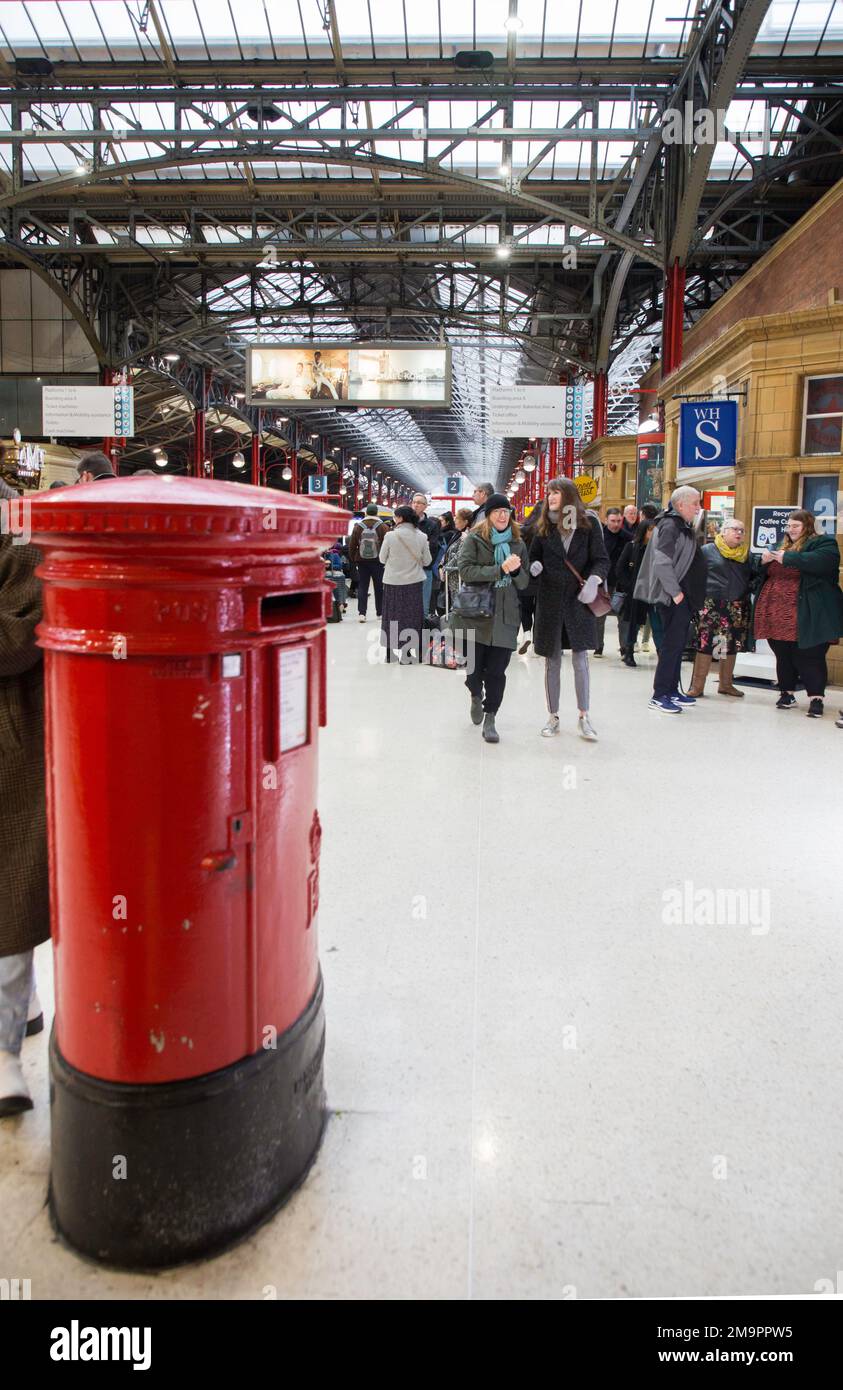 Passengers and red post box at Marylebone Station London and Chiltern ...