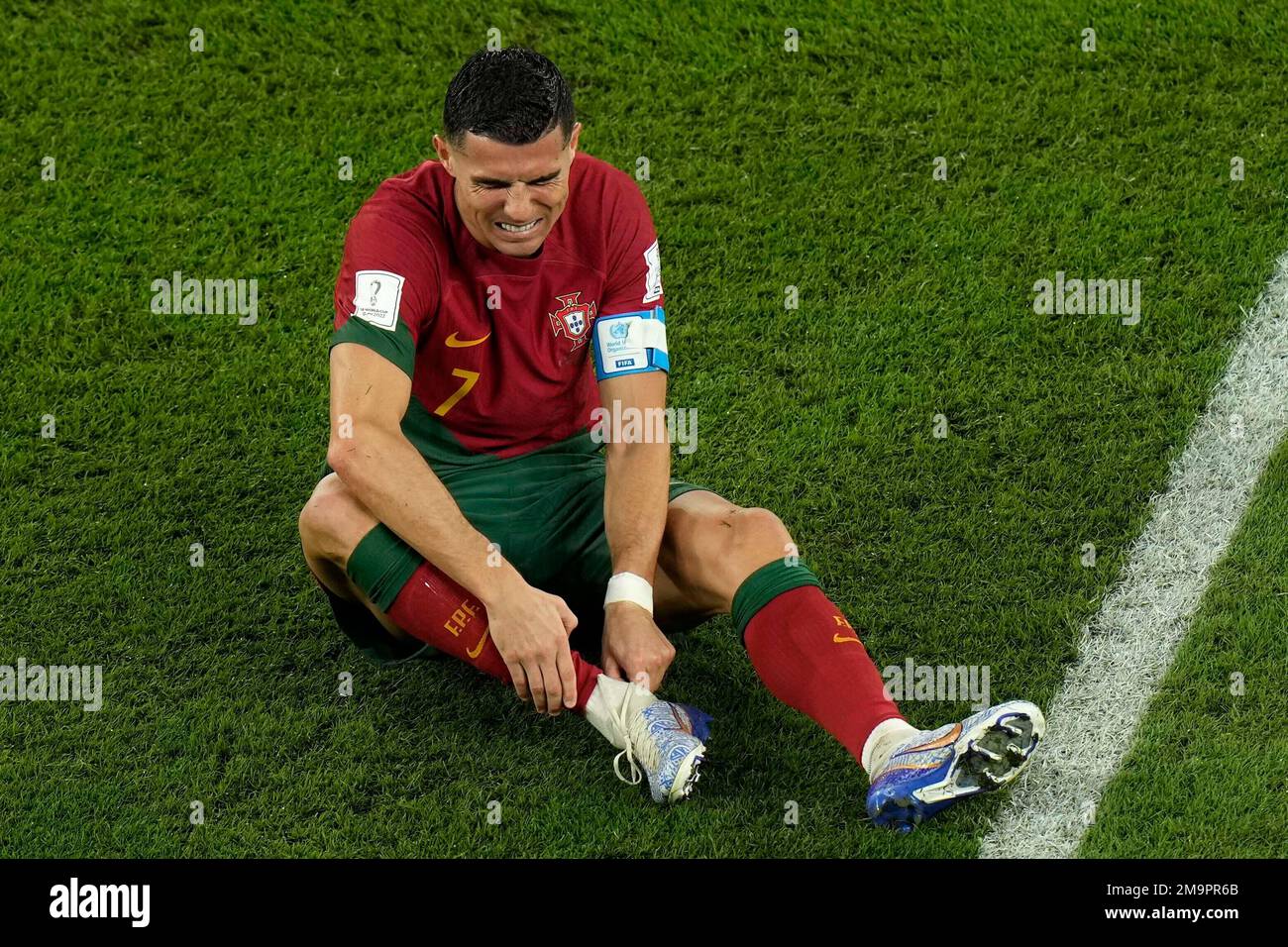 Portugal's Cristiano Ronaldo sits on the ground during the World Cup ...