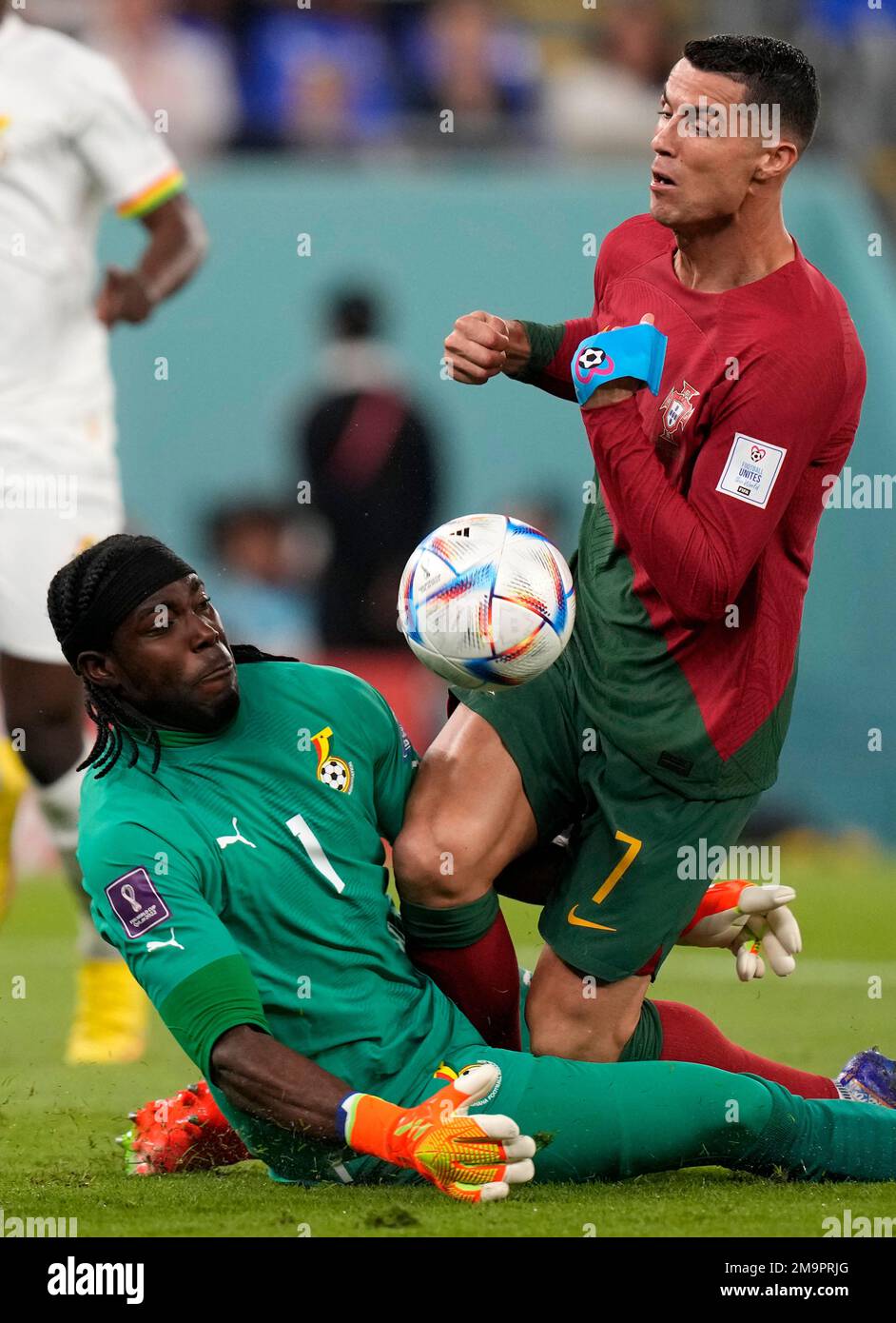 Ghana's goalkeeper Lawrence Ati-Zigi, left, makes a save against ...