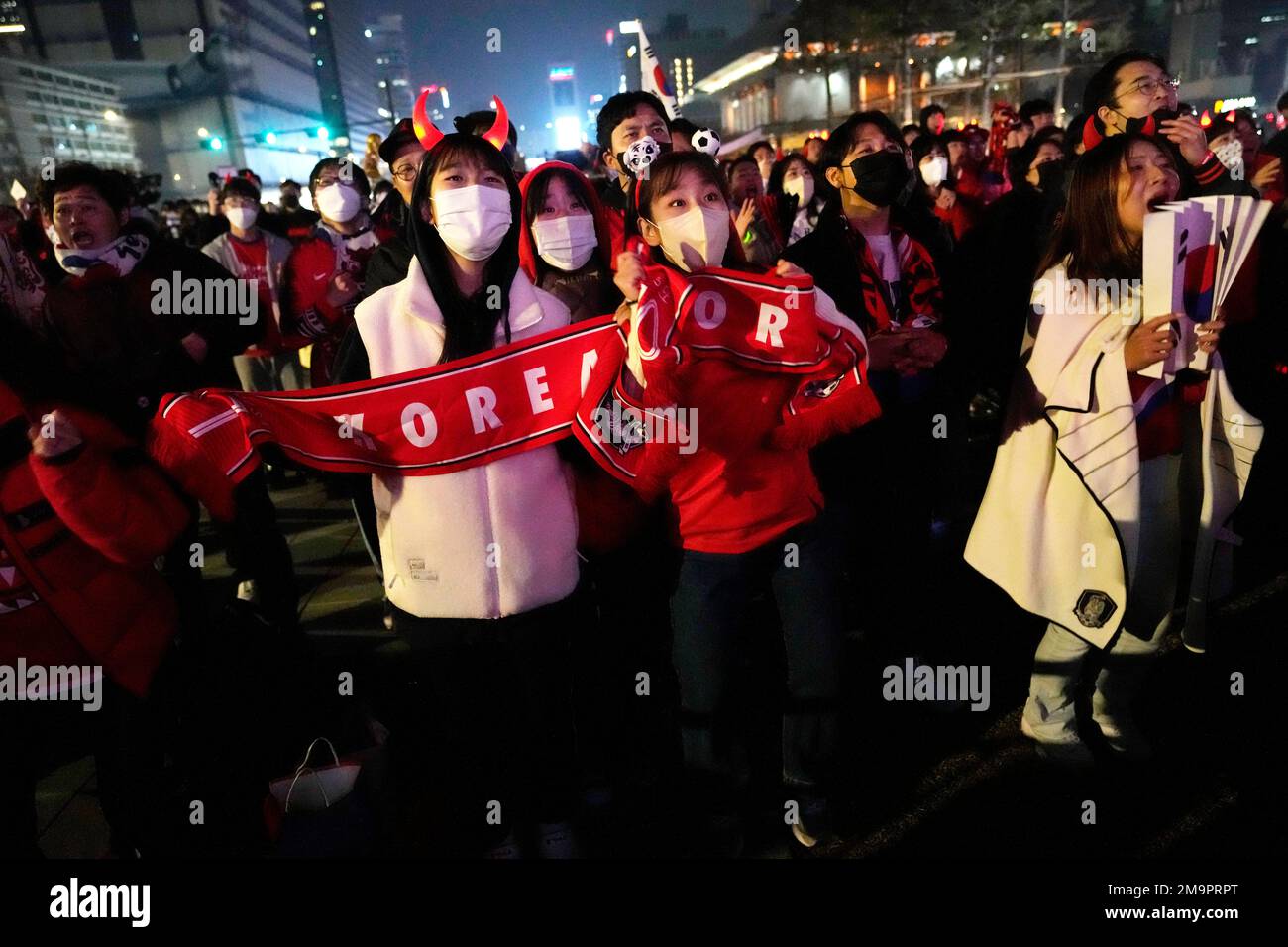 South Korean soccer fans watch a live broadcasting of the Group H World ...