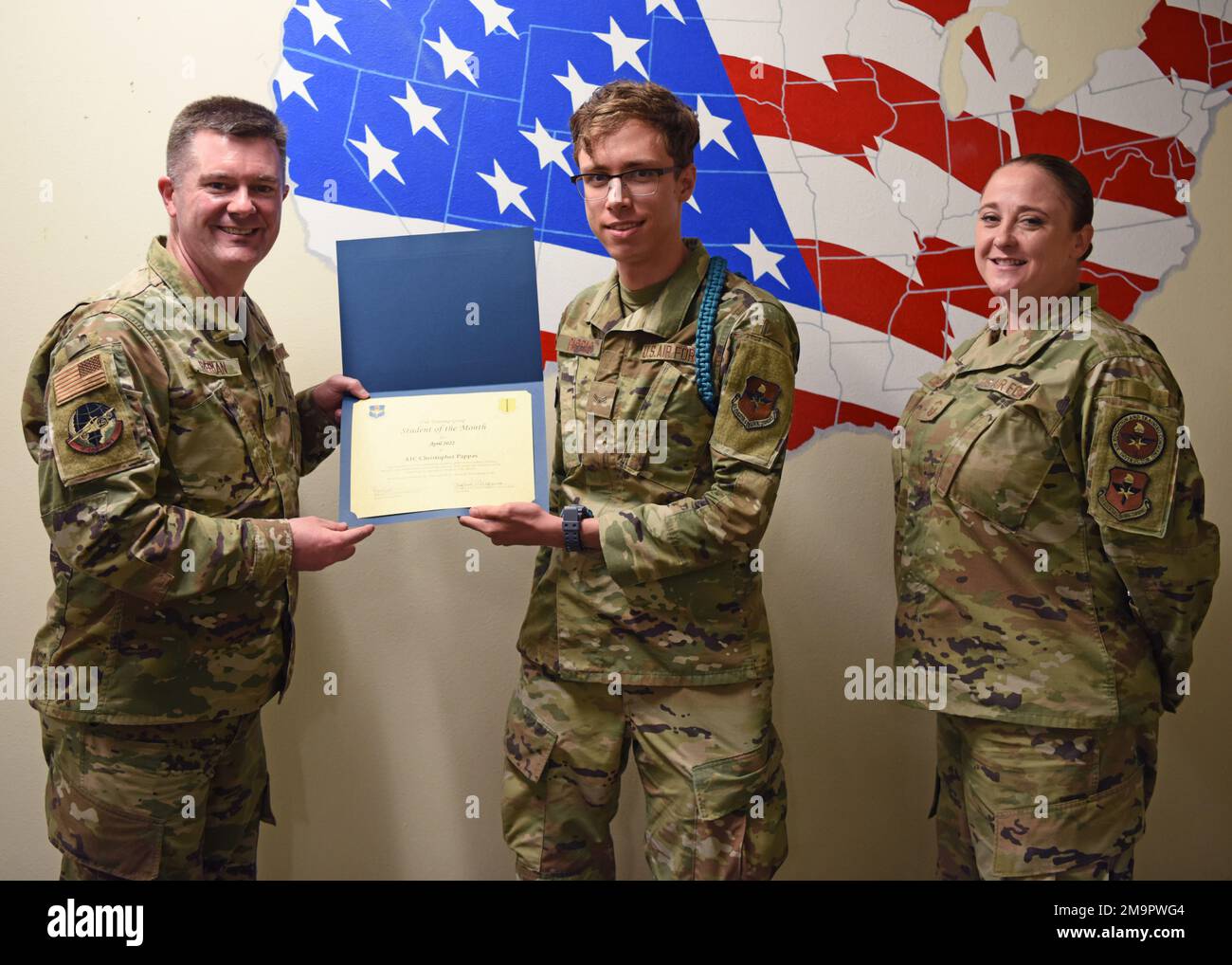 U.S. Air Force Lt. Col. James Freeman, 17th Training Group deputy commander, presents the 316th ...