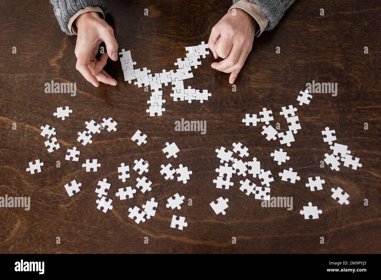 top view of cropped man with parkinson disease and hands tremor ...