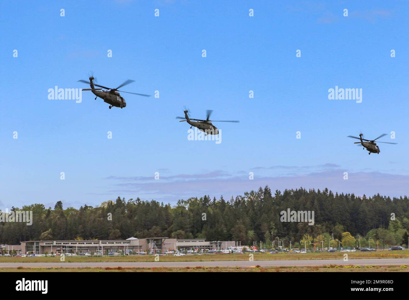 A flight of UH-60 Black Hawk helicopters assigned to Bravo Company, 2 ...