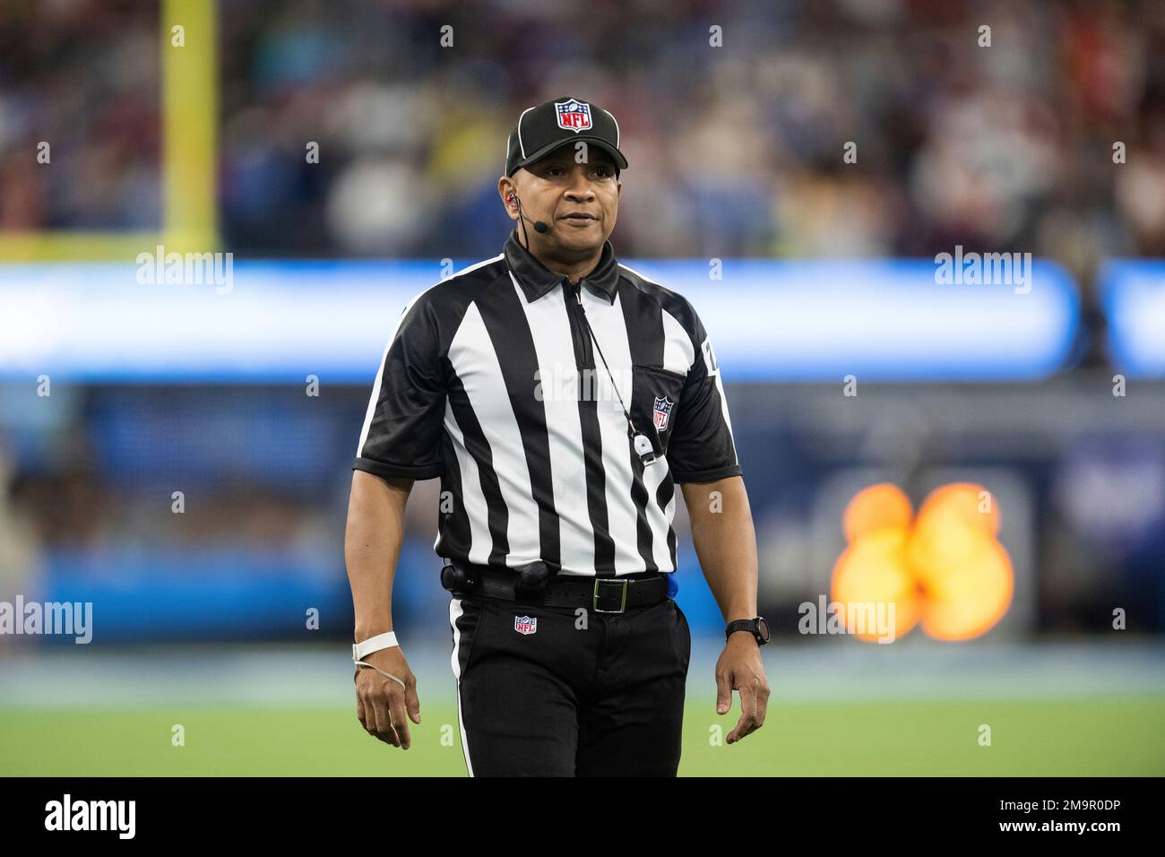 Down judge Patrick Holt (106) during an NFL football game between the ...
