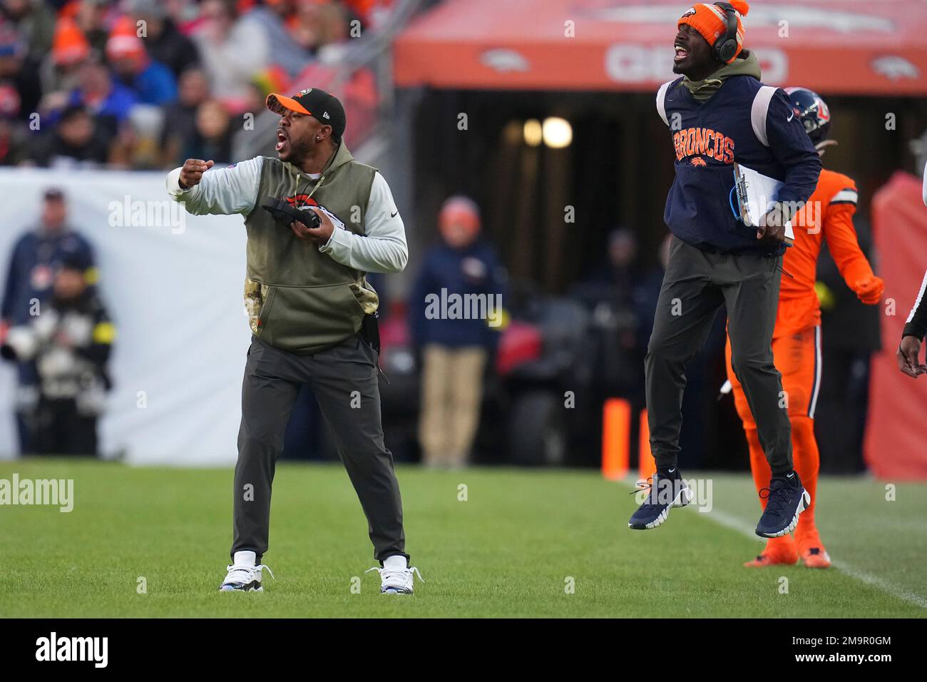 Denver Broncos defensive backs coach Christian Parker, left, and ...